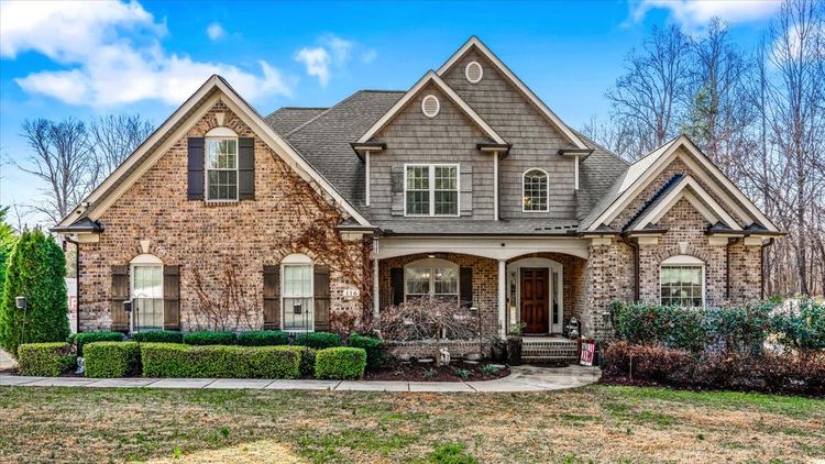 Welcome to this beautiful, traditional all-brick 4-bedroom, 2.5 bath ...