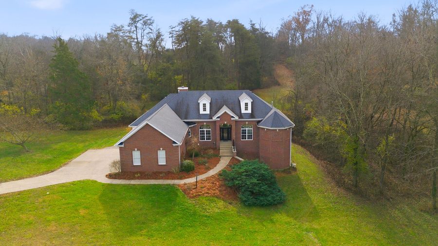 Refined living, privately set across 4.75 acres. - Louisville Business ...