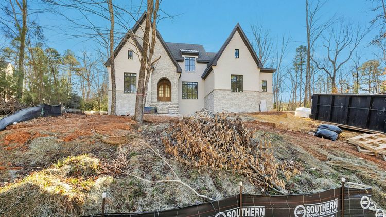 Put your feet up and enjoy an expansive lake and nature preserve view ...