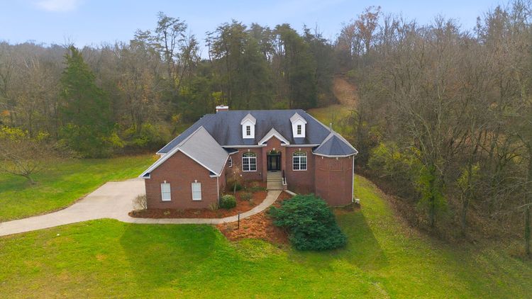 Refined living, privately set across 4.75 acres. - Louisville Business ...