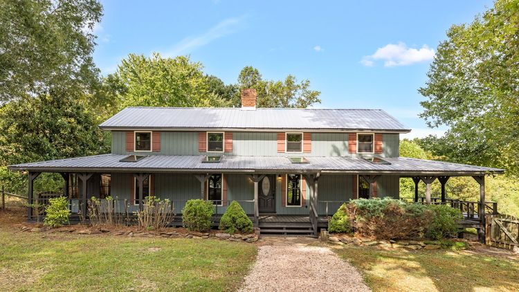 This stunning English Tudor includes many old world features. - Triad ...